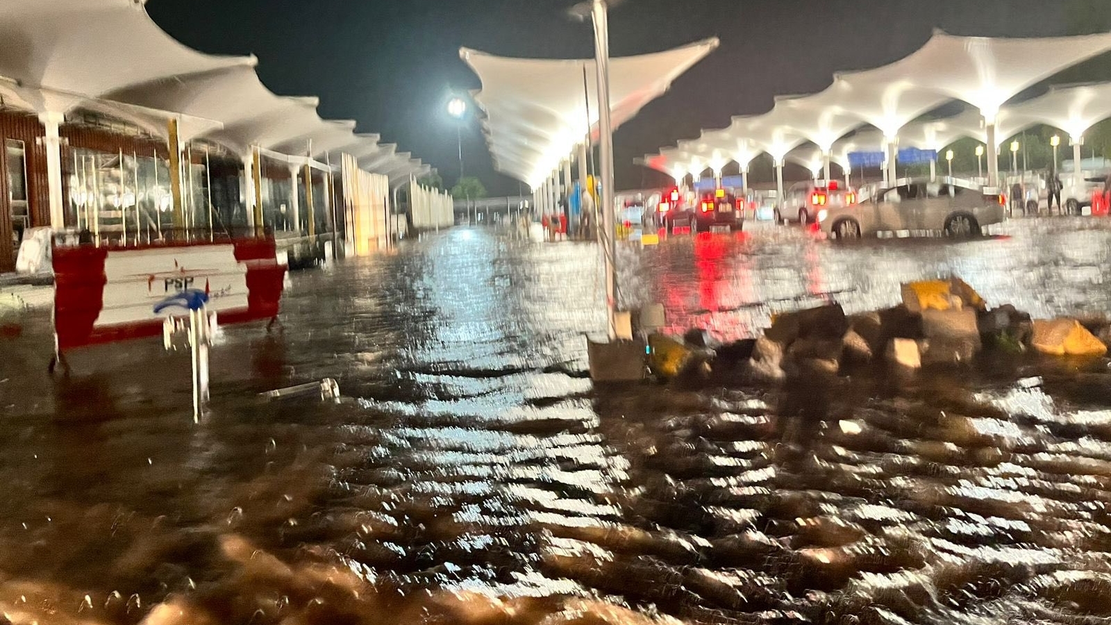 Ahmedabad Airport Flooded Passengers Wade Through Knee deep Water Ahmedabad Airport Flooded Passengers Wade Through Knee deep Water